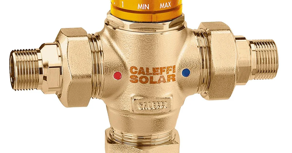 Thermostatic mixing valve with interchangeable cartridge for solar ...